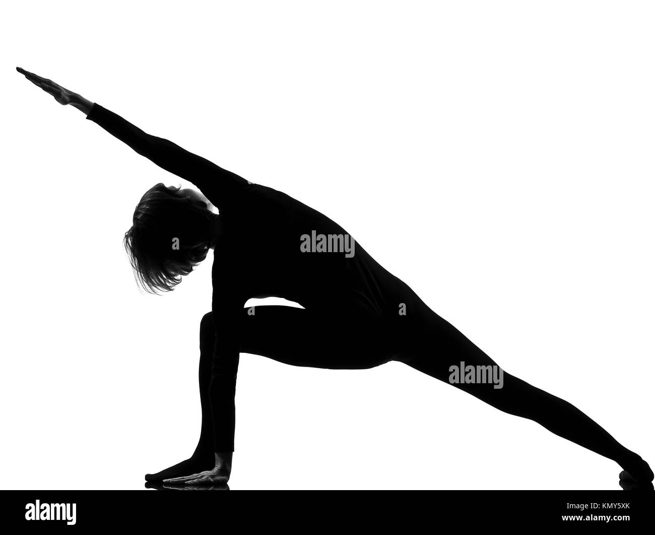 woman yoga posture Extended Side Angle Pose position in silouhette on ...