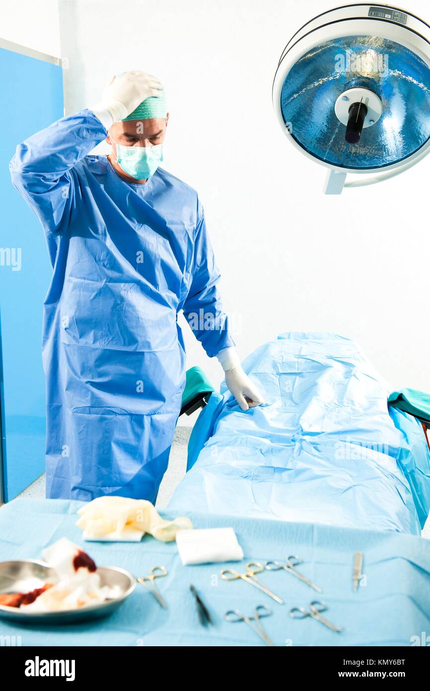 Depressed/Worried Surgeon inside operating room Stock Photo - Alamy