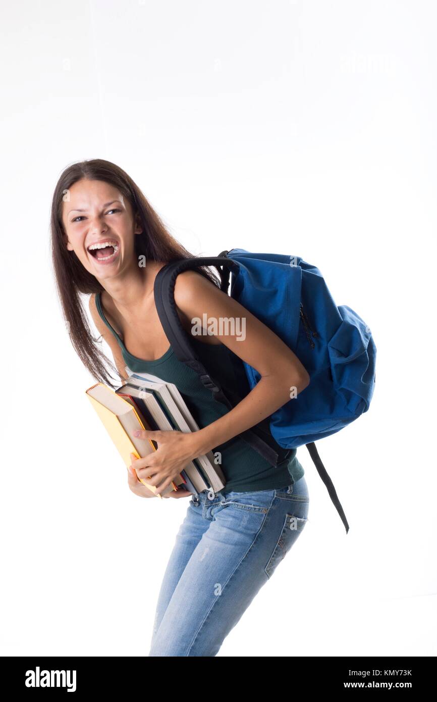 Laughing female student on white background Stock Photo - Alamy