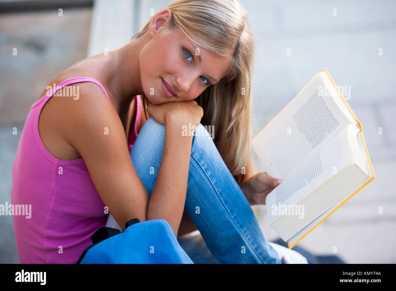 Beautiful student studying outdoors Stock Photo - Alamy