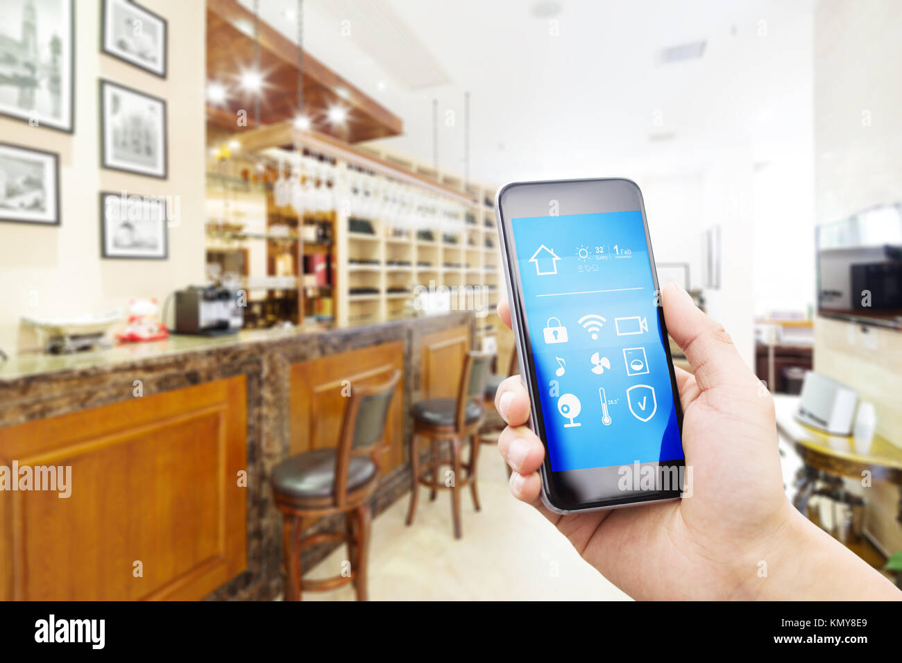 mobile phone with smart home app in modern wine cellar Stock Photo - Alamy