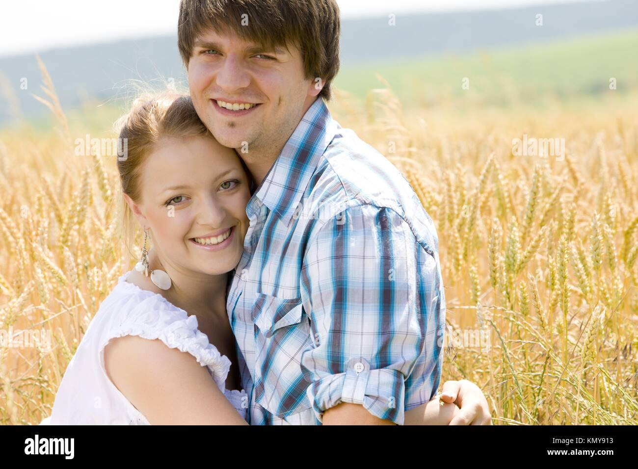 hugging couple´´s portrait Stock Photo - Alamy