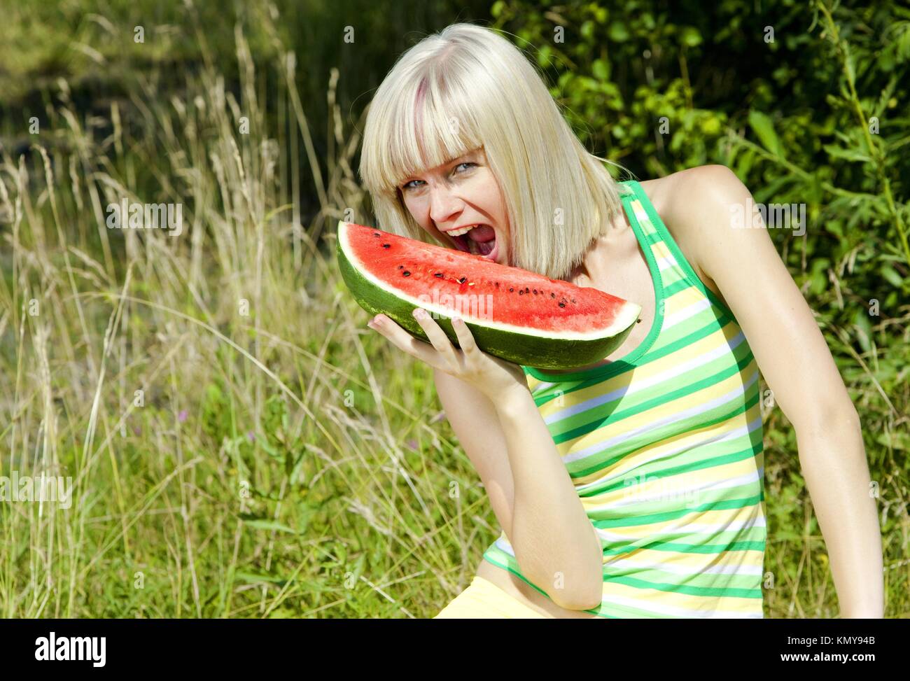 portrait of woman with melon Stock Photo - Alamy