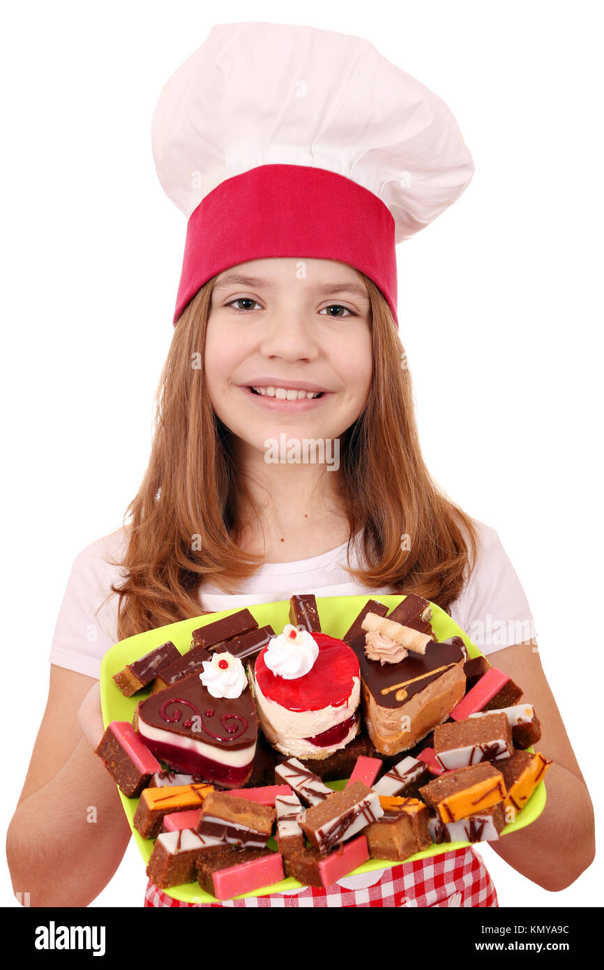 happy little girl cook with sweet cakes Stock Photo - Alamy
