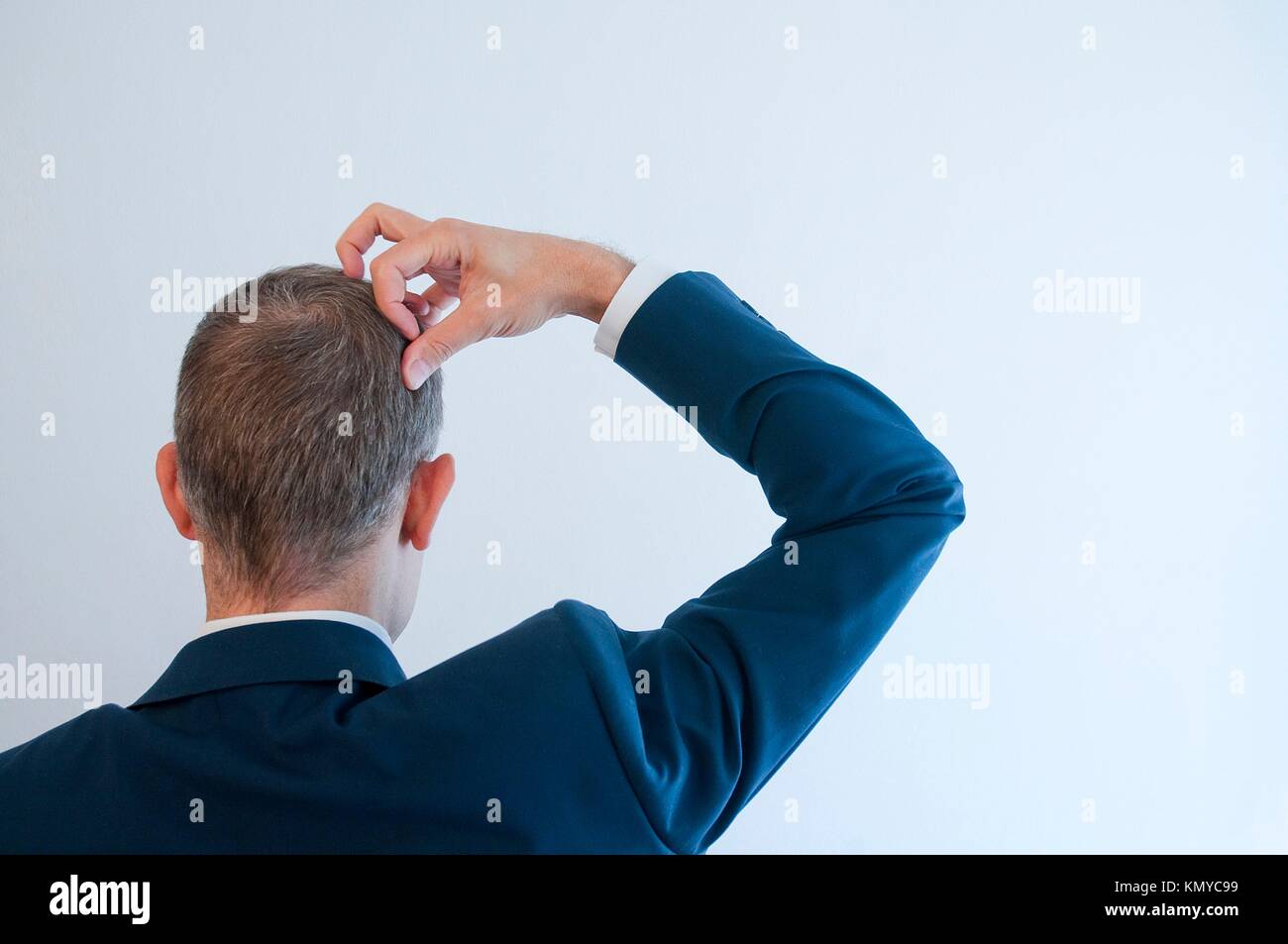 Scratching one arm hi-res stock photography and images - Alamy