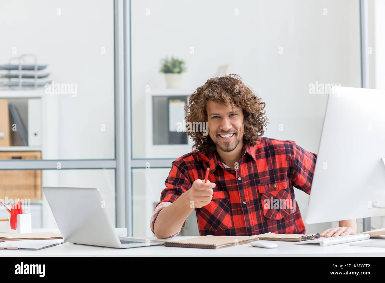 Young man modern laptop in hi-res stock photography and images - Alamy