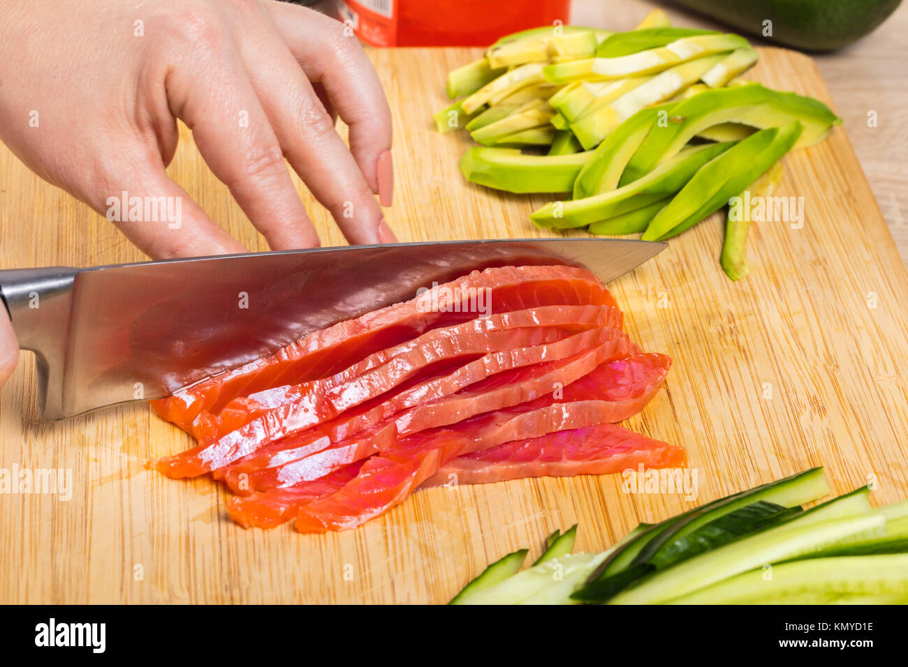 Professional chef hands cutting avocado hi-res stock photography and ...