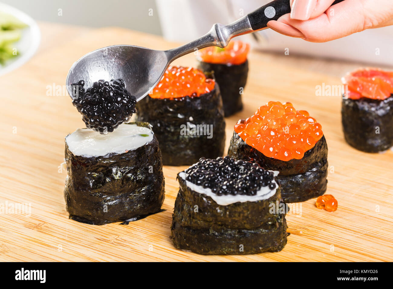 Japanese chef. Chef prepares rolls, hands closeup Stock Photo - Alamy