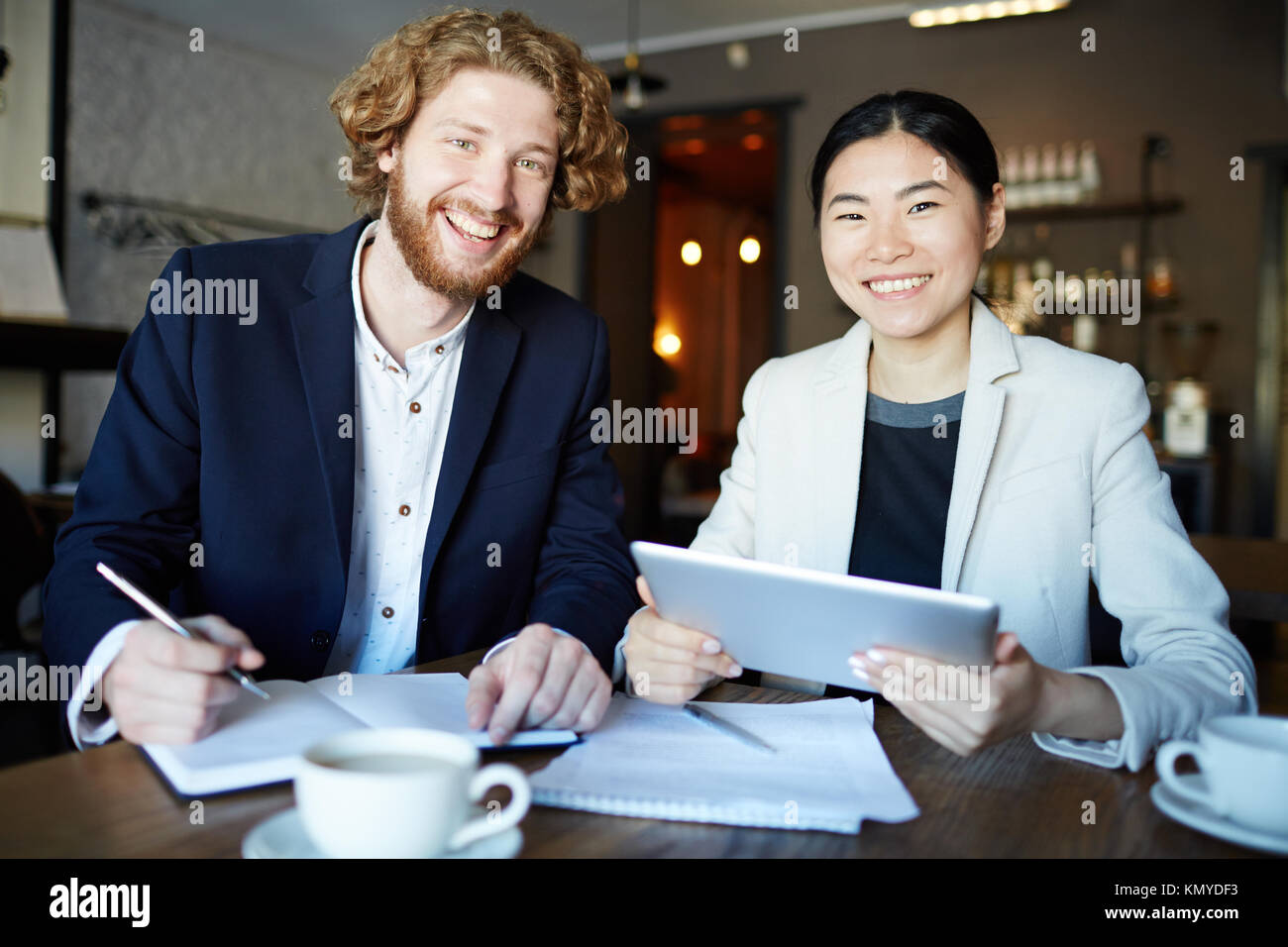 Group successful managers looking hi-res stock photography and images ...