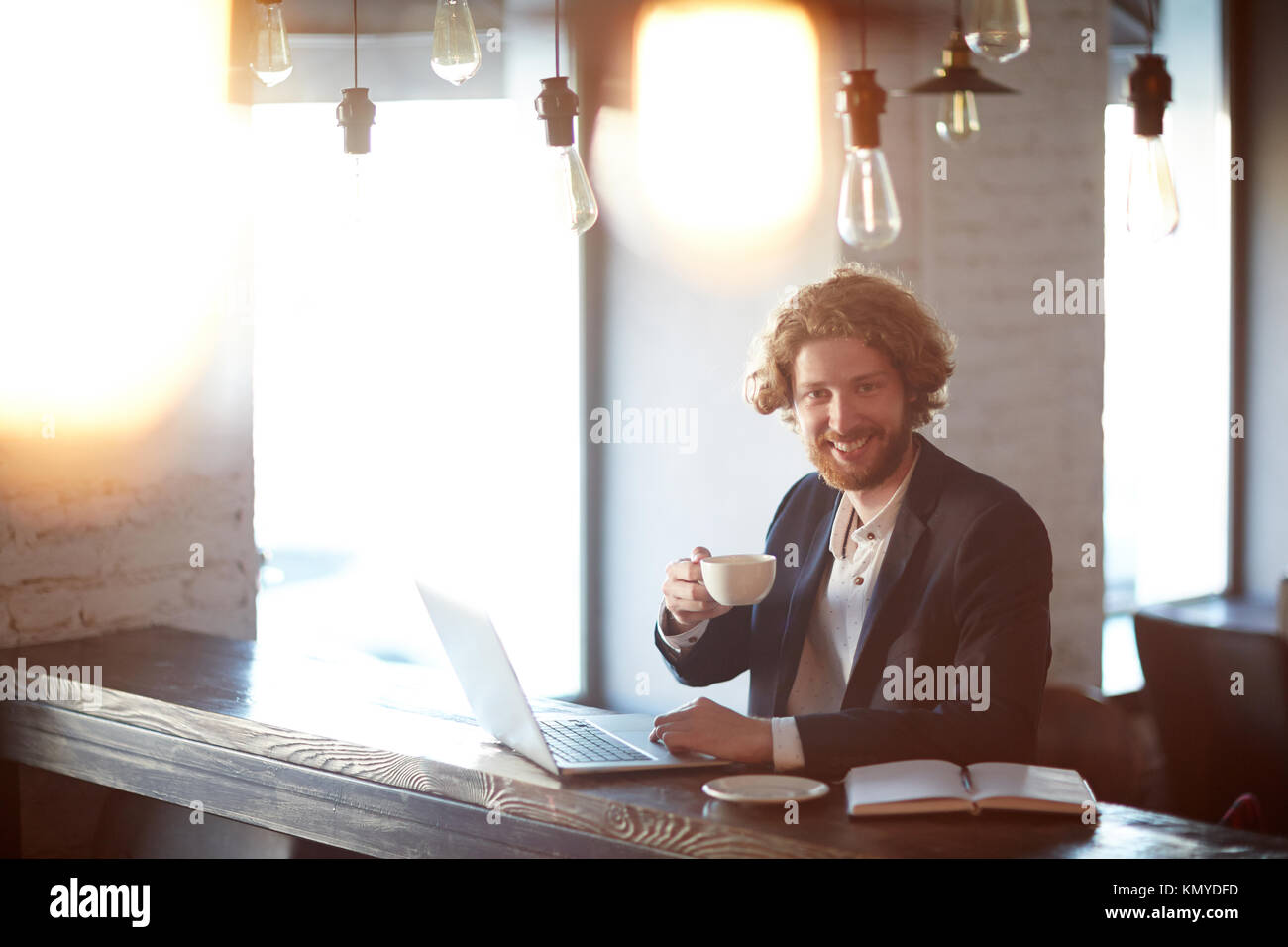 Having coffee break Stock Photo - Alamy