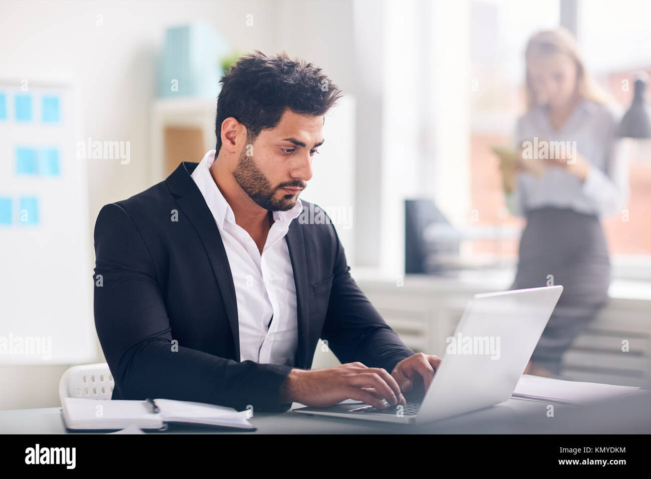 Analyst working in office Stock Photo - Alamy