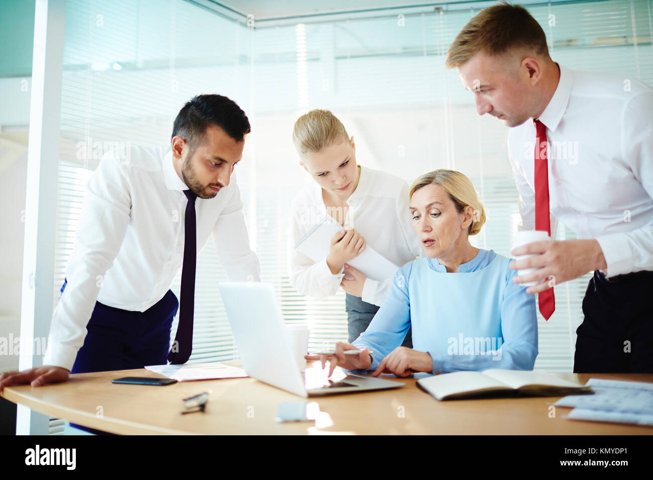Looking through online sources Stock Photo - Alamy