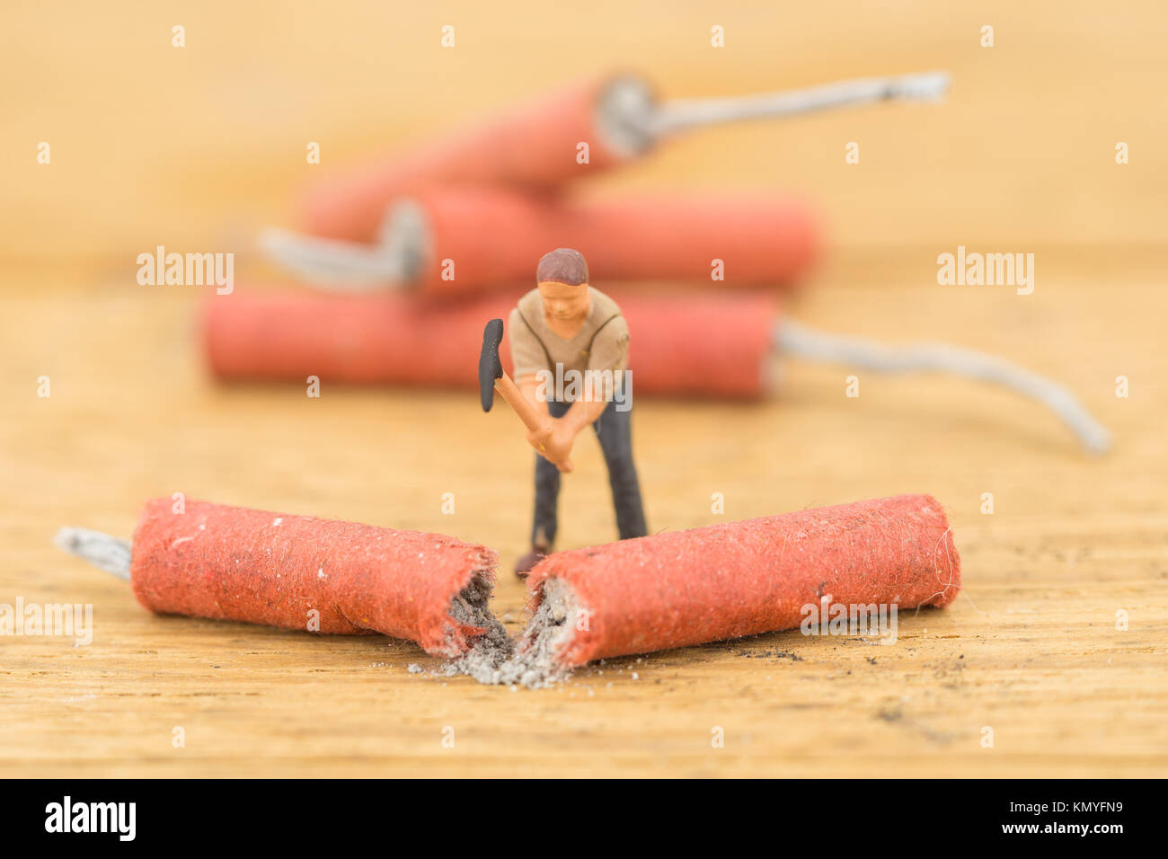 Concept miniature people destroying a Firecracker or dynamite Stock ...