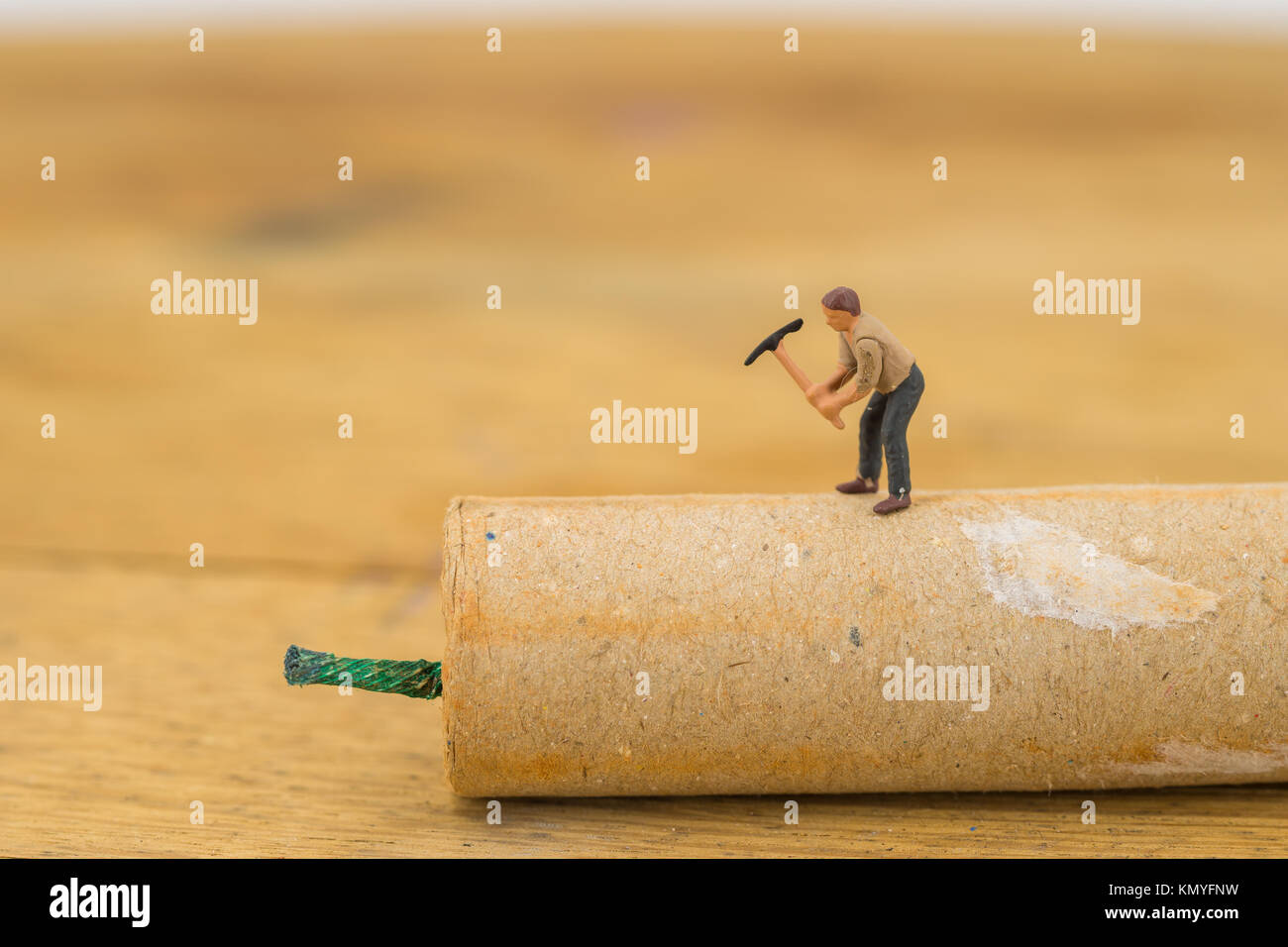 Concept miniature people destroying a Firecracker or dynamite Stock ...