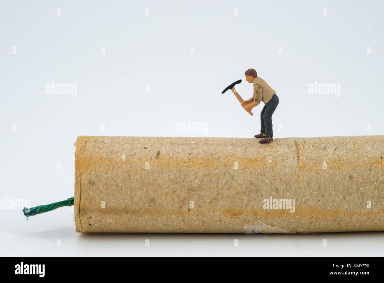 Concept miniature people destroying a Firecracker or dynamite Stock ...