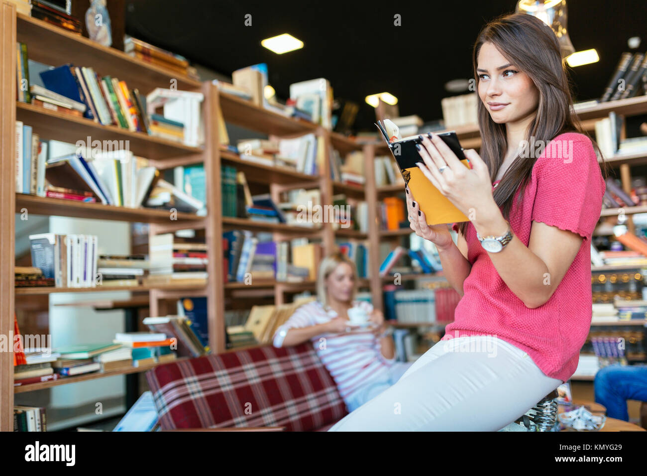 Students reading books in library Stock Photo - Alamy