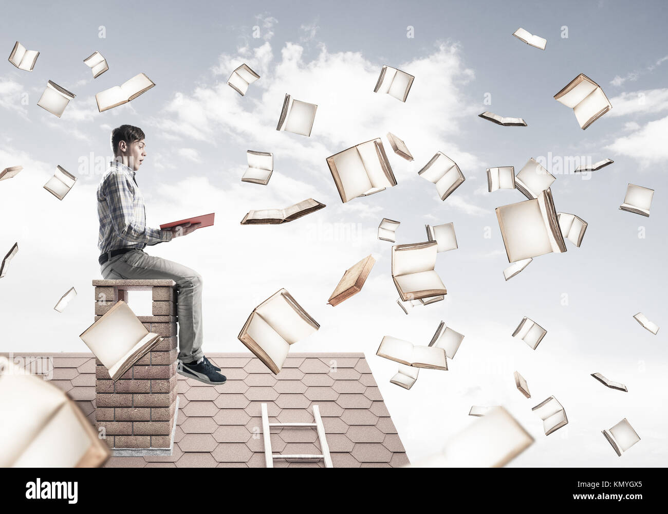 Man reading book and many of them flying in air Stock Photo - Alamy