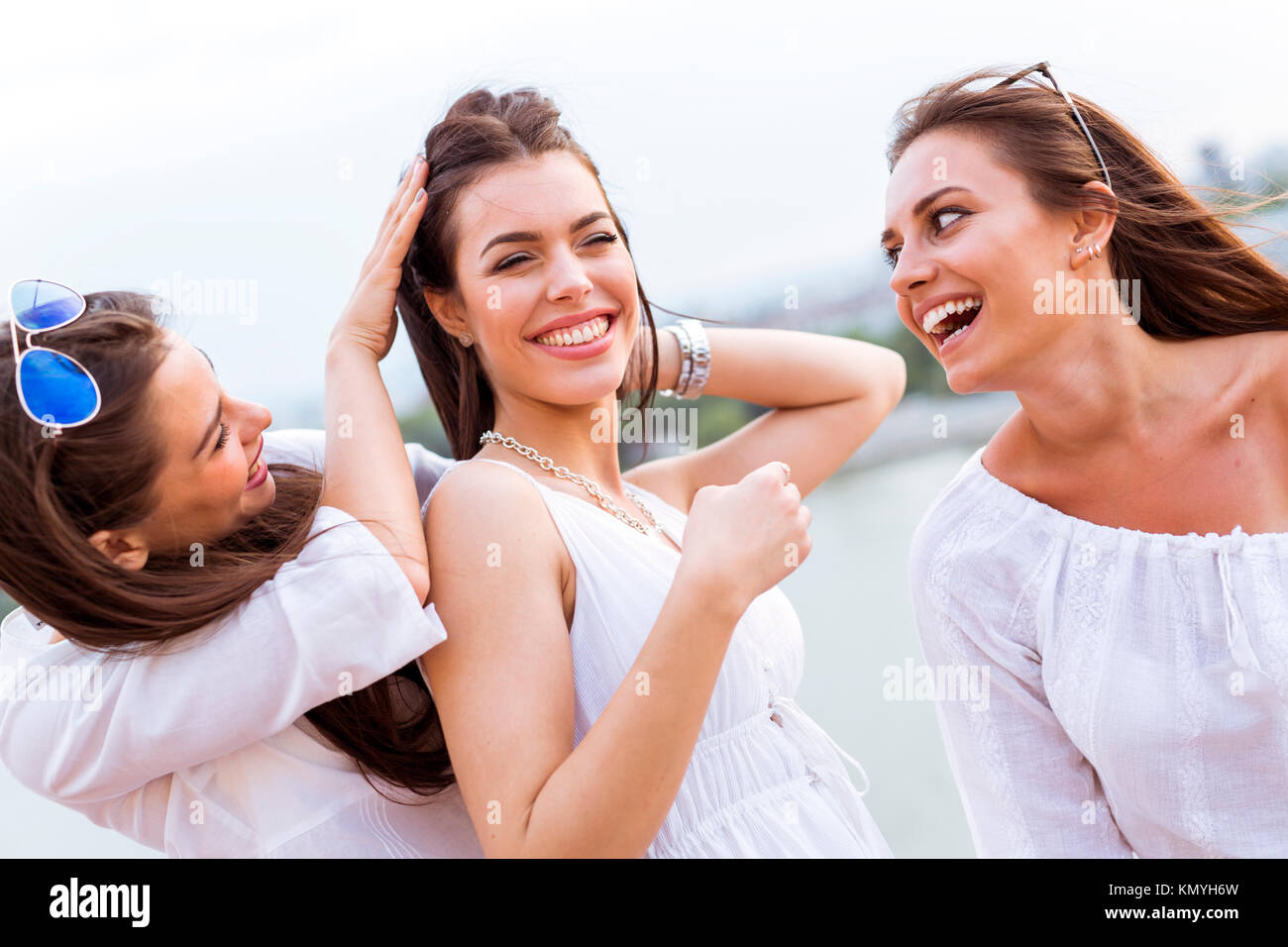 Cheerful women having fun outdoors Stock Photo - Alamy