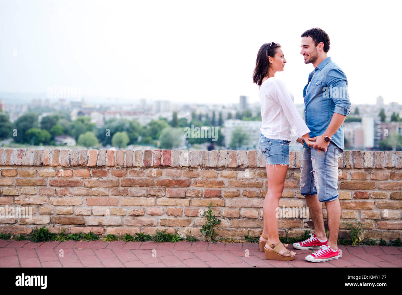 Couple in love being close to each other outdoors Stock Photo - Alamy