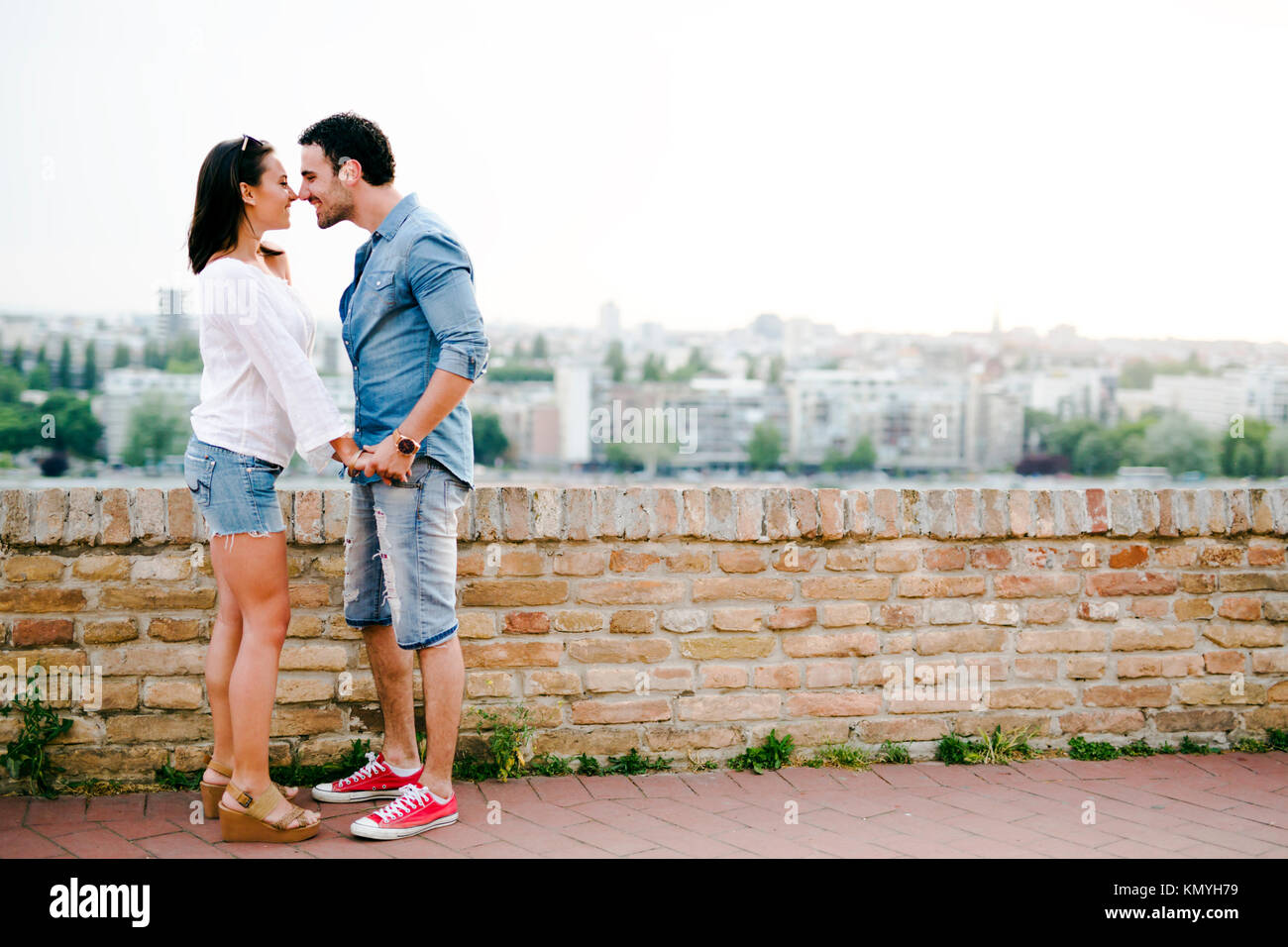Couple in love being close to each other outdoors Stock Photo - Alamy