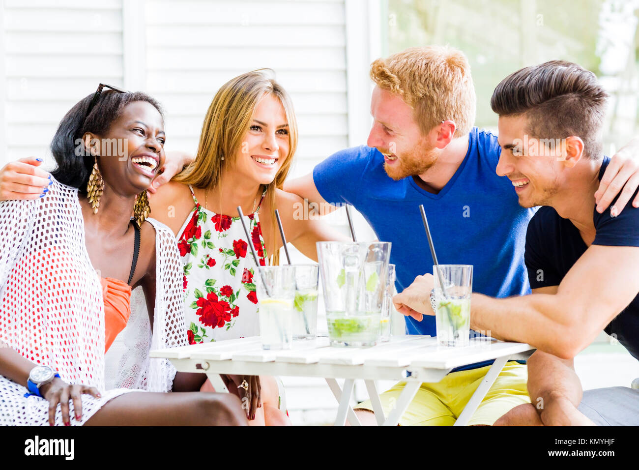 Women laughing restaurant table hi-res stock photography and images - Alamy