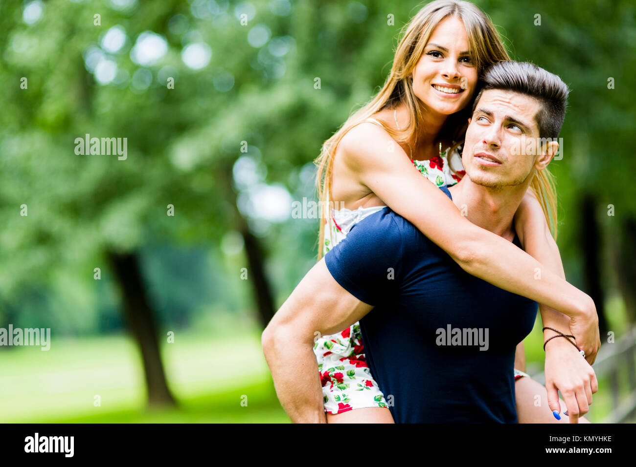 Happy couple in love having fun outdoors Stock Photo - Alamy