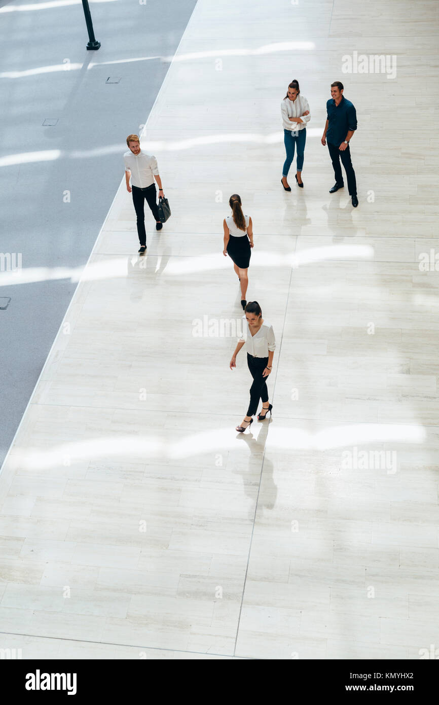 Young business people before starting work Stock Photo - Alamy