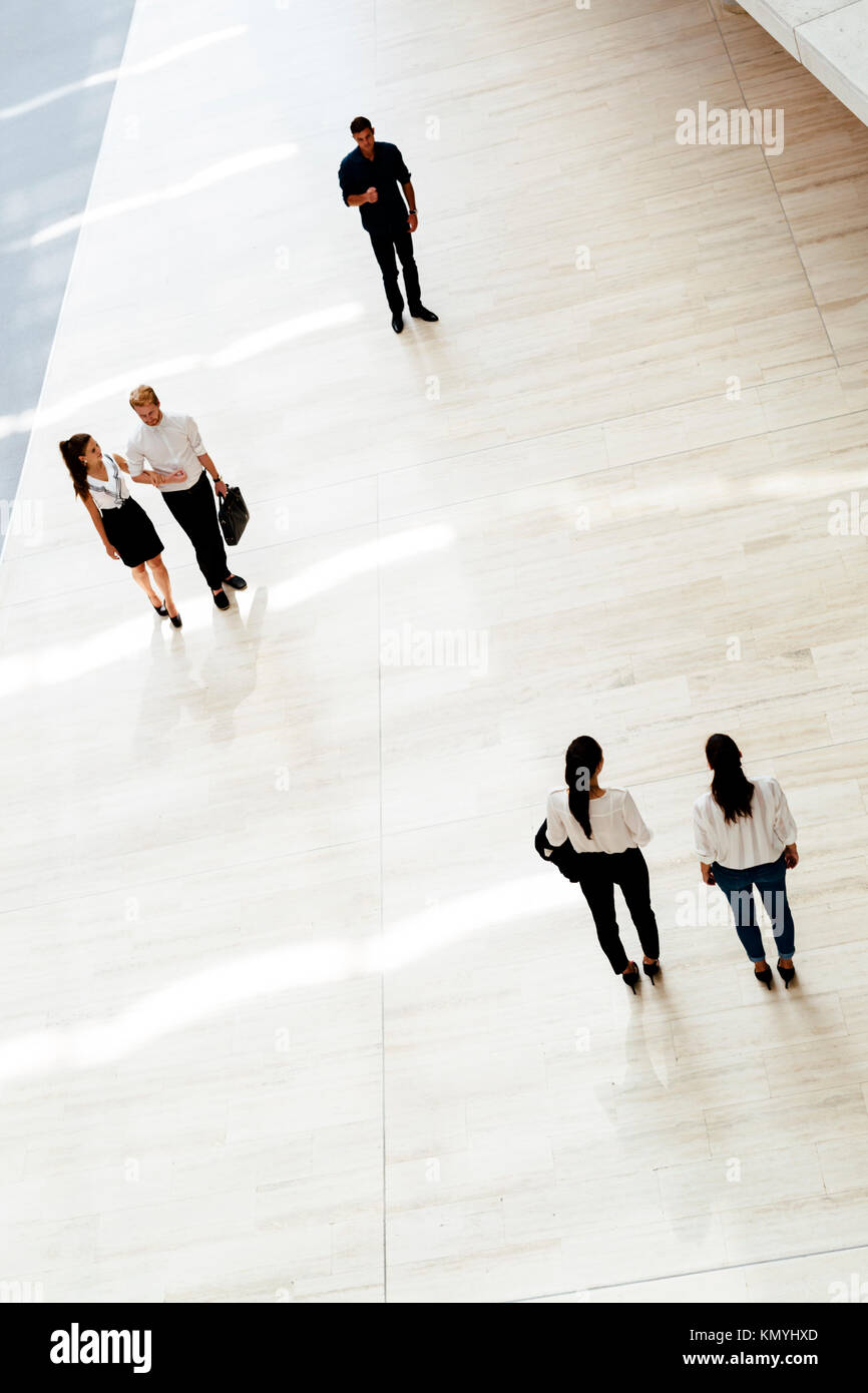 Young business people before starting work Stock Photo - Alamy