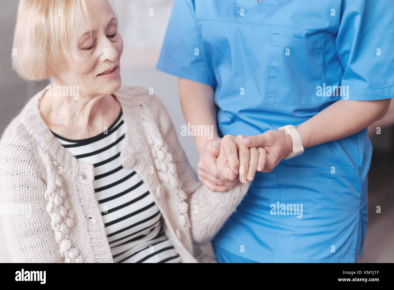 Nurse holding hands patient hi-res stock photography and images - Alamy