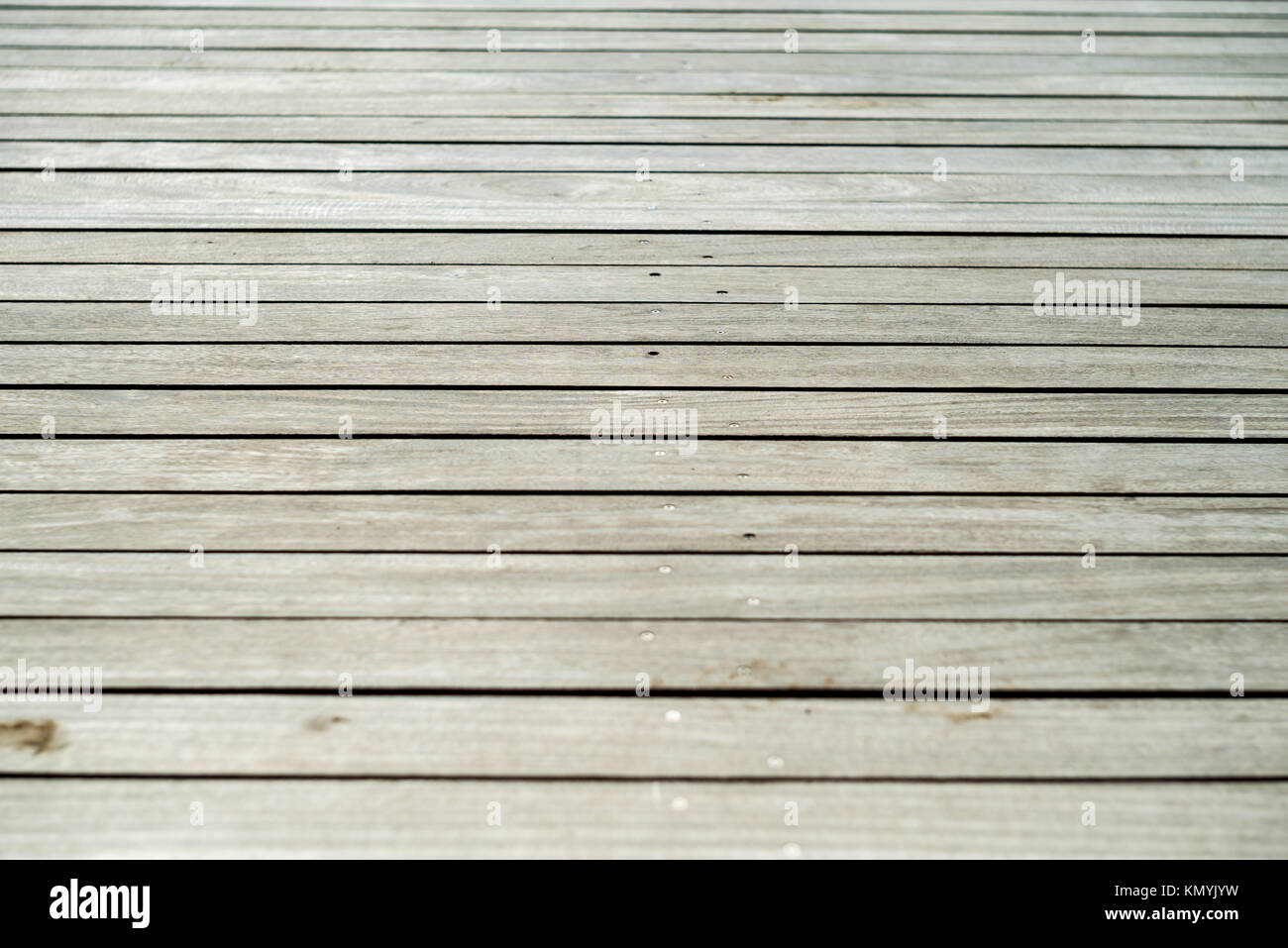 Wodden platform dock by the sea on a bright sunny day Stock Photo - Alamy