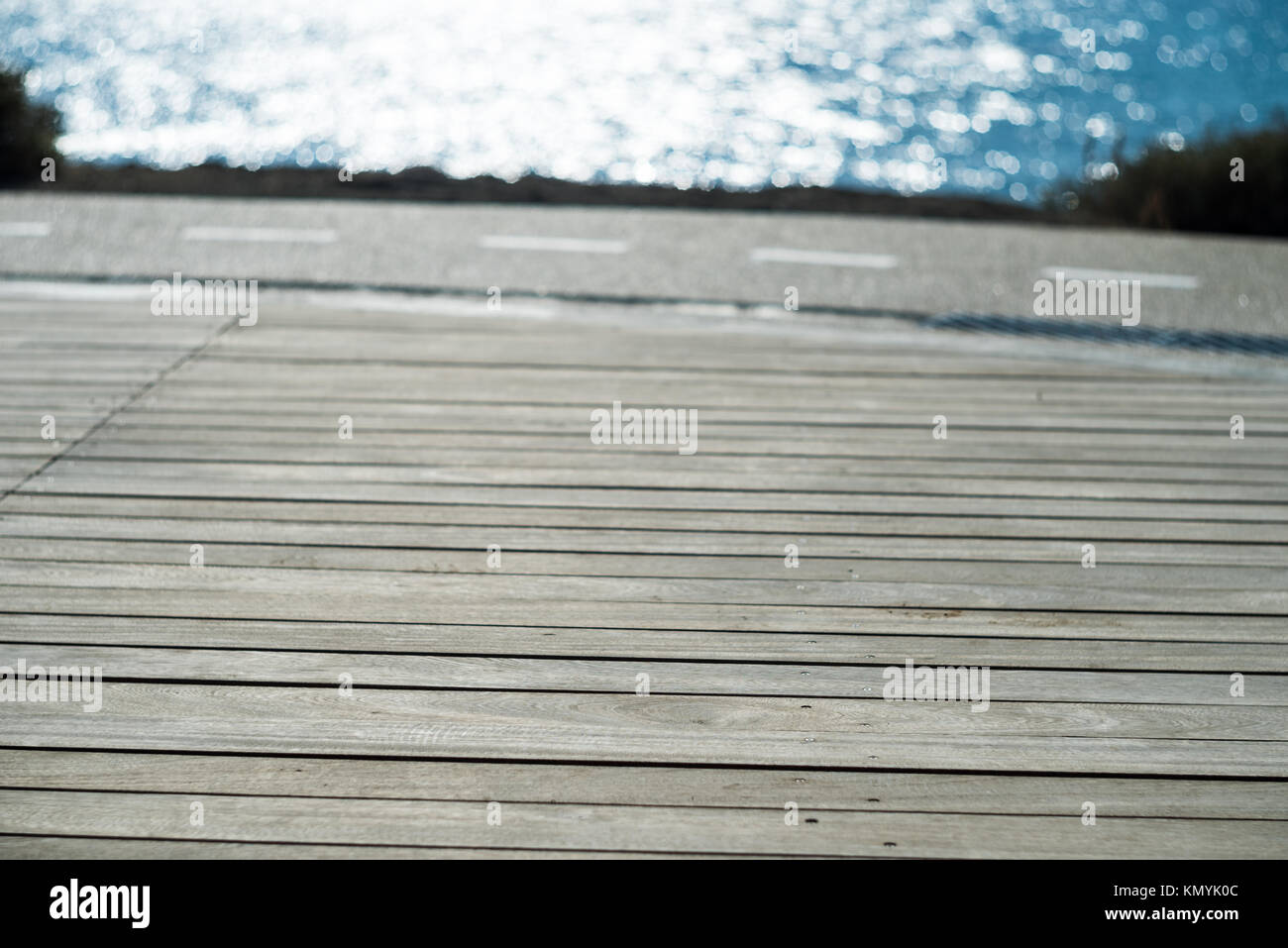 Wodden platform dock by the sea on a bright sunny day Stock Photo - Alamy
