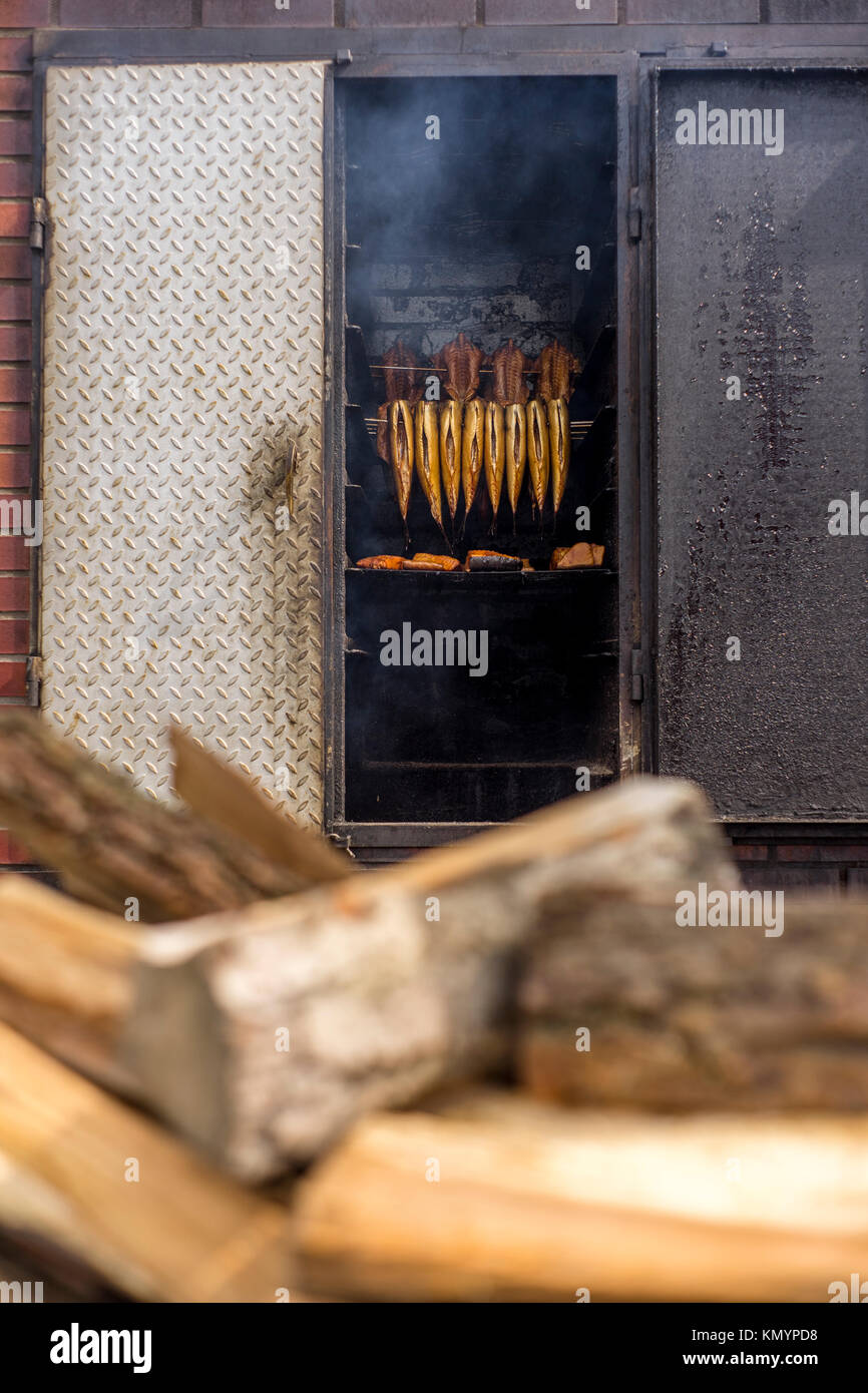 Fish is smoked in a smoker, Mielno, Poland 2017 Stock Photo - Alamy