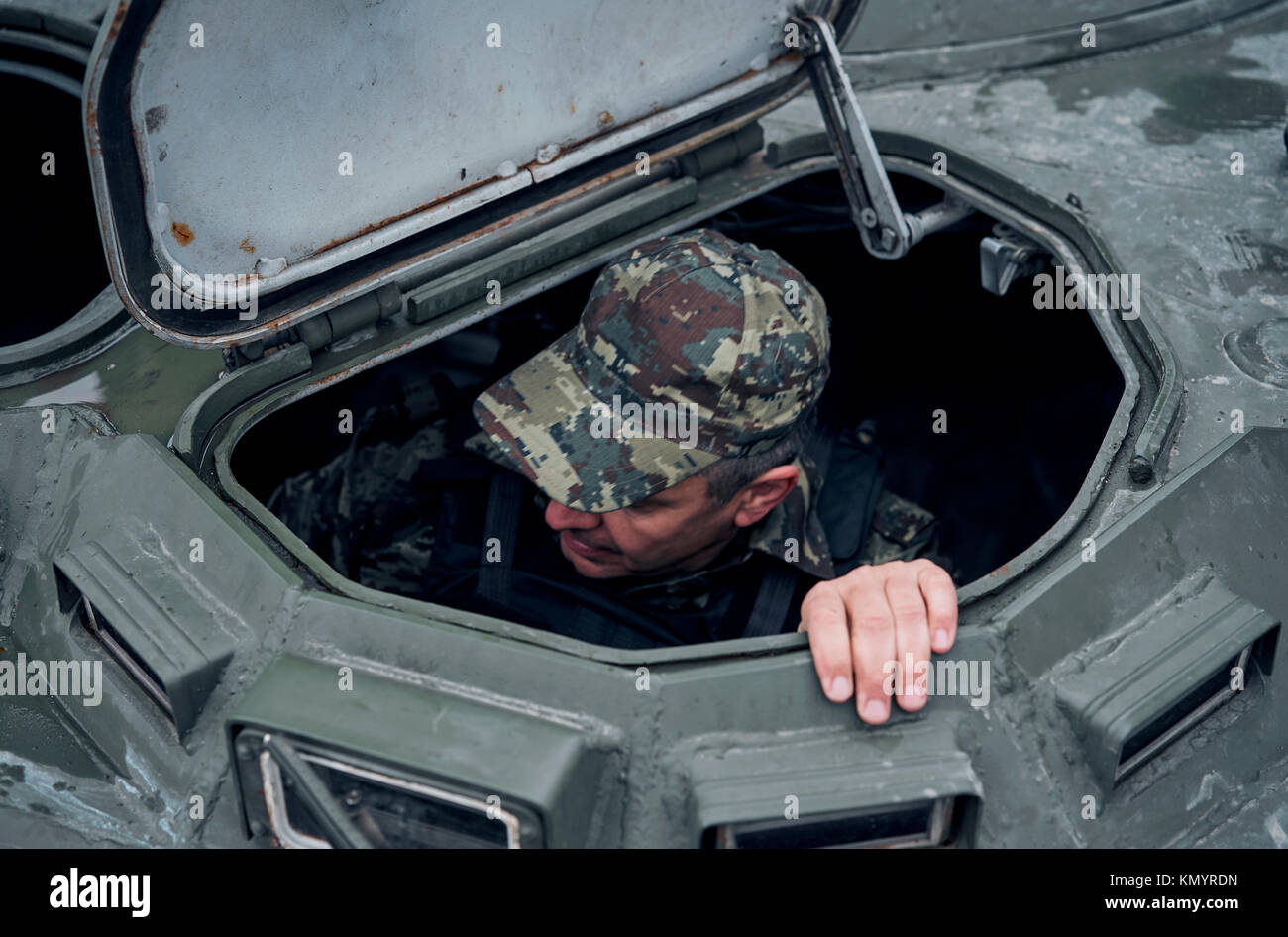 fighter climbs into the hatch of a combat vehicle Stock Photo - Alamy