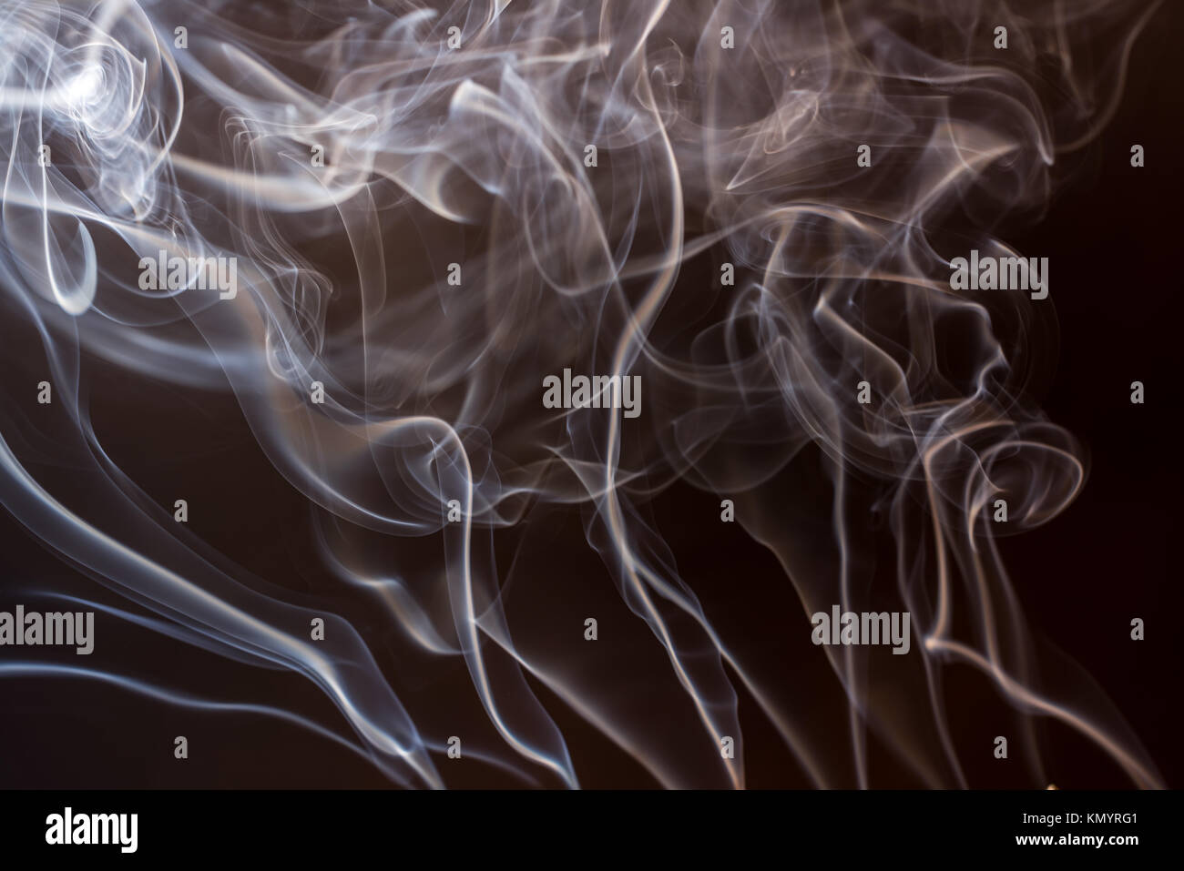 Incense on a black background. Smoke movement patterns of background ...