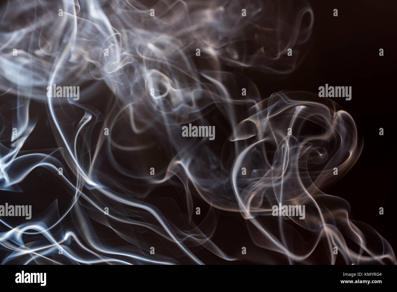 Incense on a black background. Smoke movement patterns of background ...