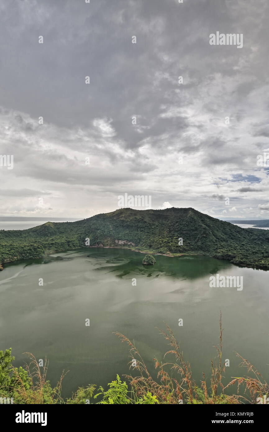 Heavy rainfall over Vulcan Point wich is a small rocky island inside ...