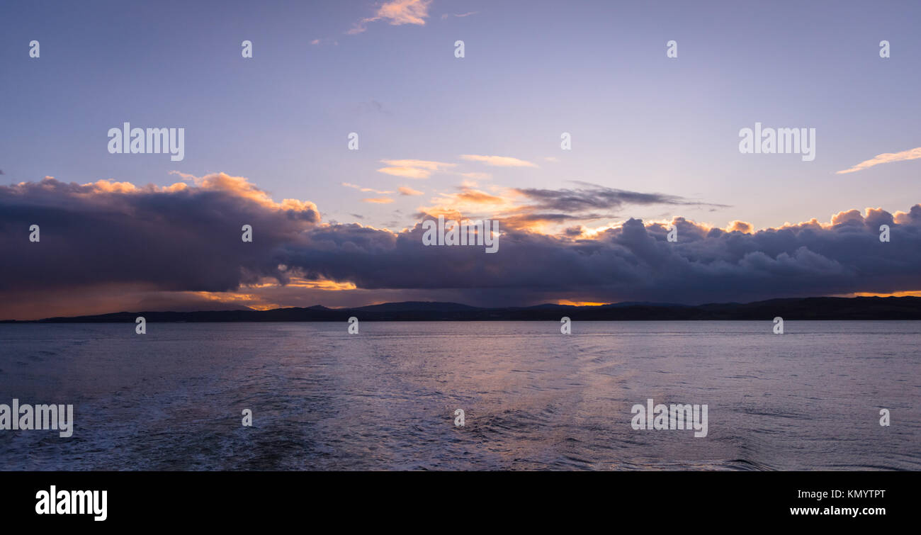 Sunrise over the sea looking out from the Isle of Mull Stock Photo - Alamy