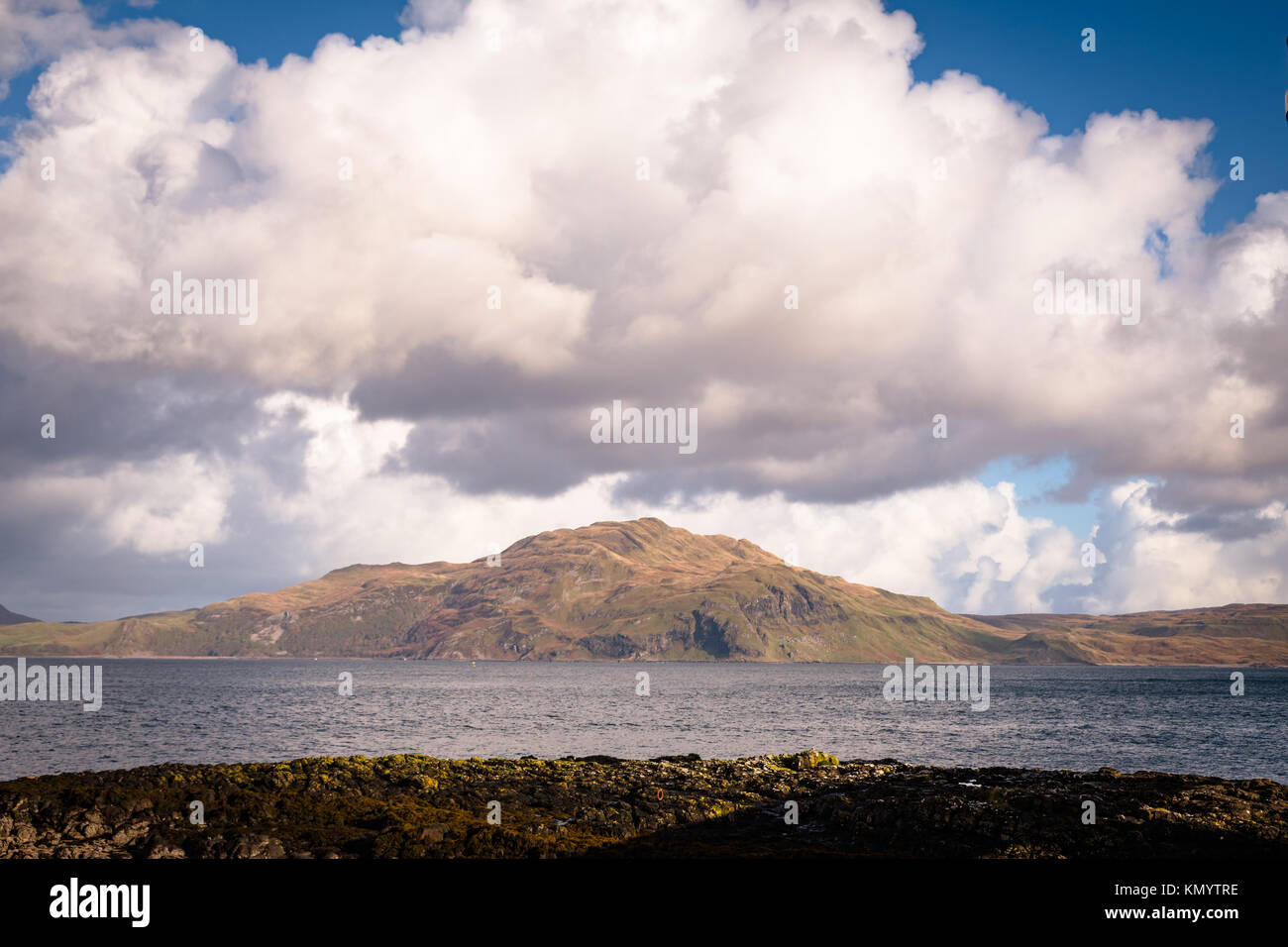 Cloudy sky over a mountain at isle of mull lighthouse, Scotland Stock ...