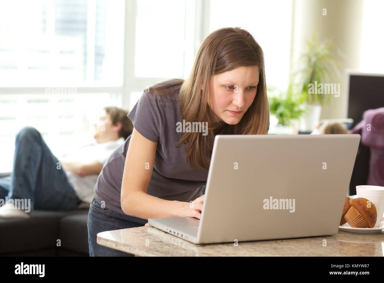 Girl child computer family alone hi-res stock photography and images ...