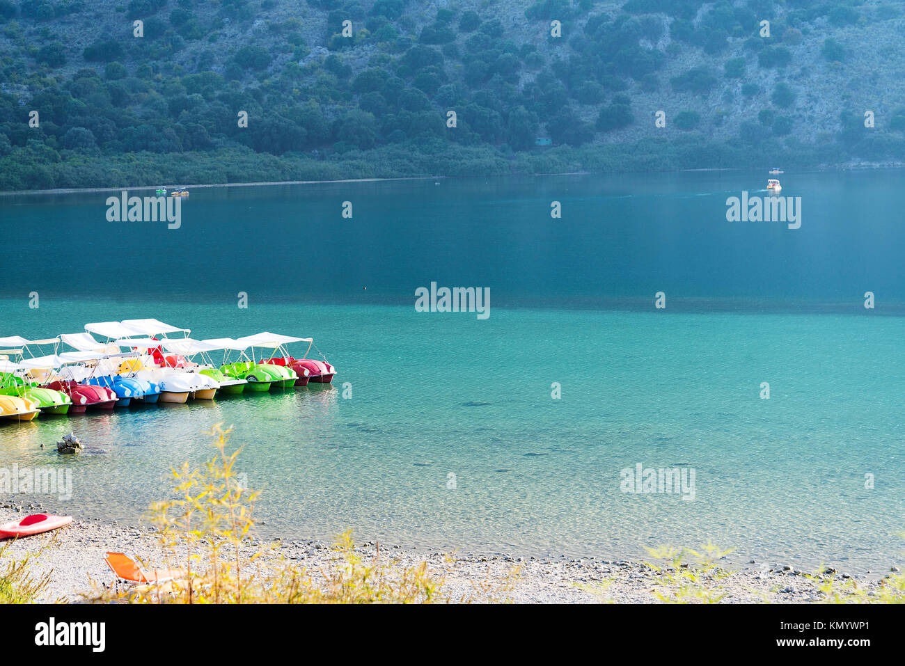 A lake with paddle boats in summer day. The island of Crete, Greece ...
