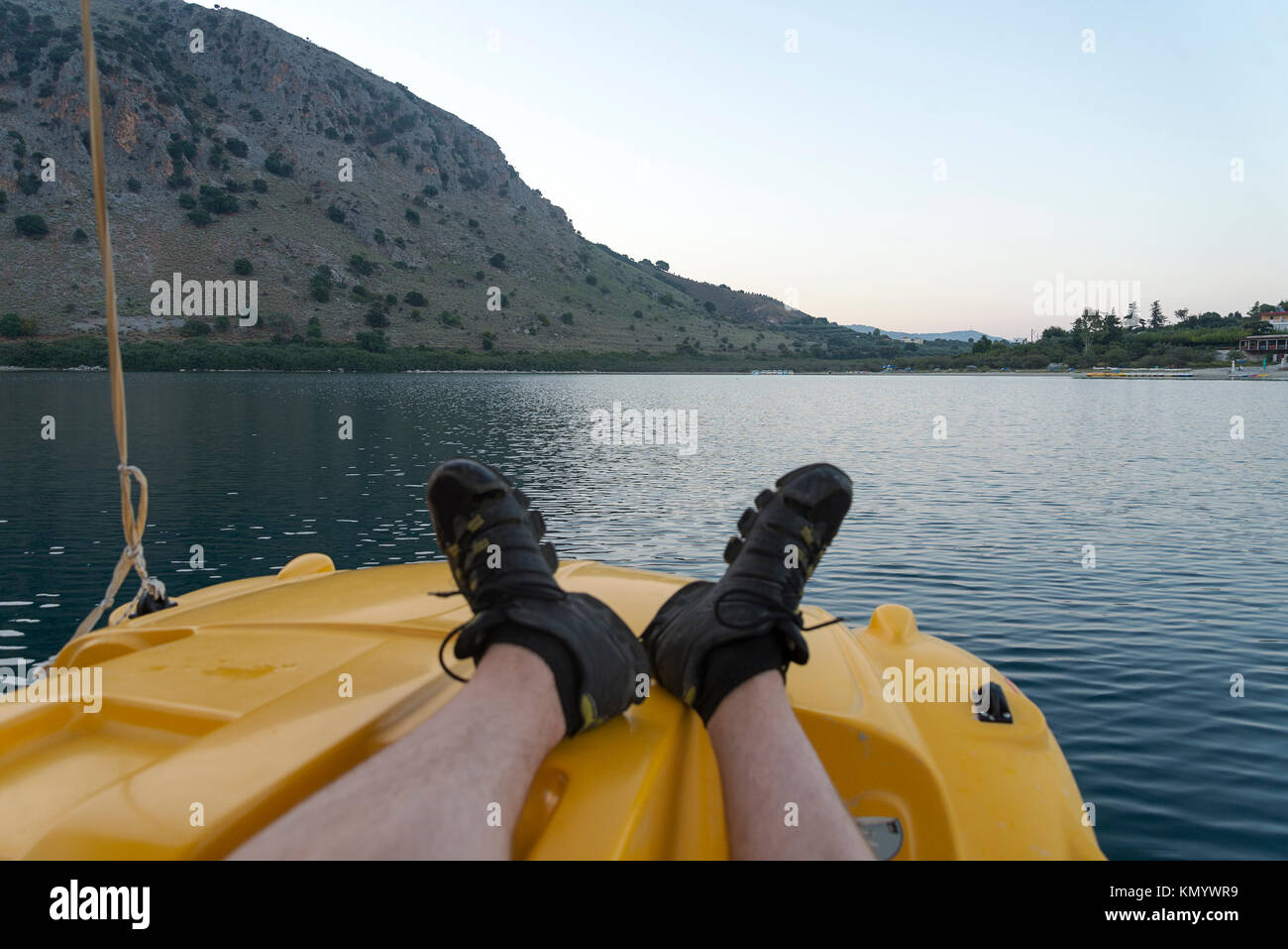 A view of the lake with catamarans in close-up. The turquoise water ...