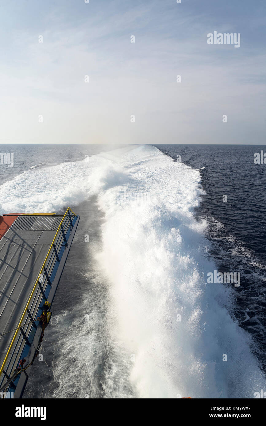 Mark on the surface of the water behind a fast moving boat at sea Stock ...