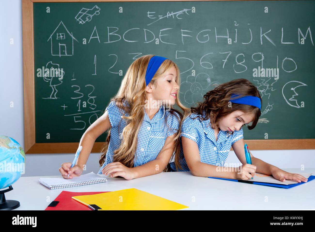 Girl cheating on test hi-res stock photography and images - Alamy