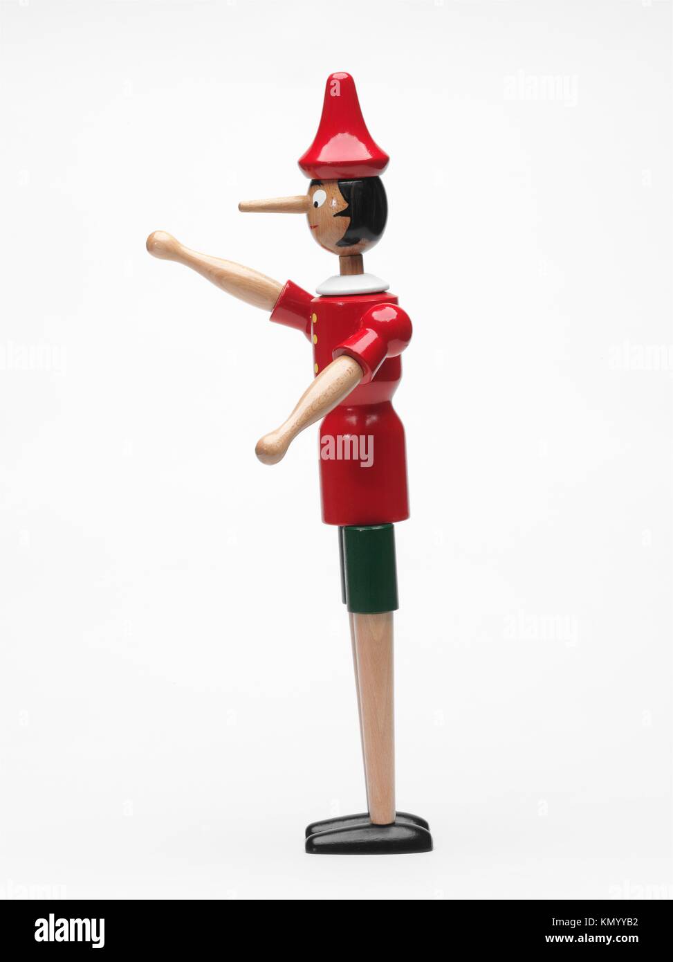 wood pinocchio on a white background Stock Photo - Alamy