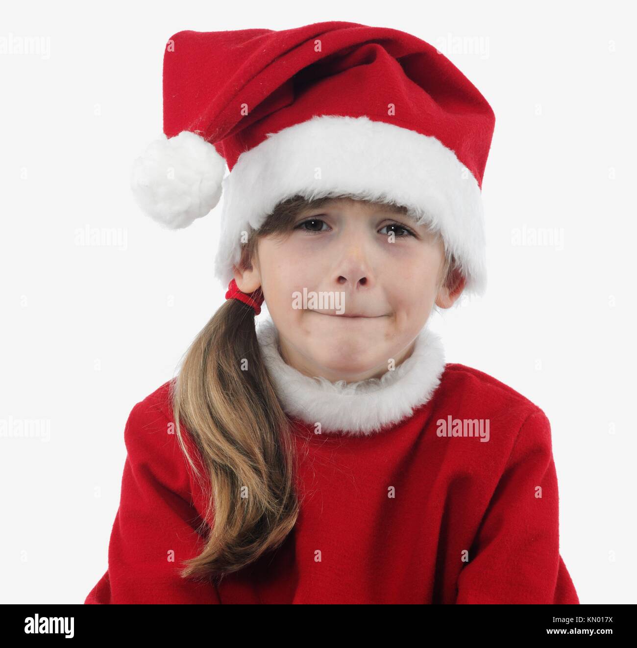Little Santa Claus ungry on the white background Stock Photo - Alamy