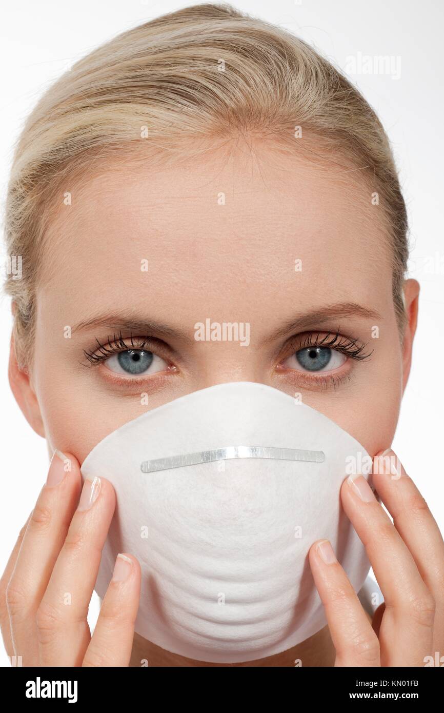 Close-up of a young woman with protecting mask Stock Photo - Alamy