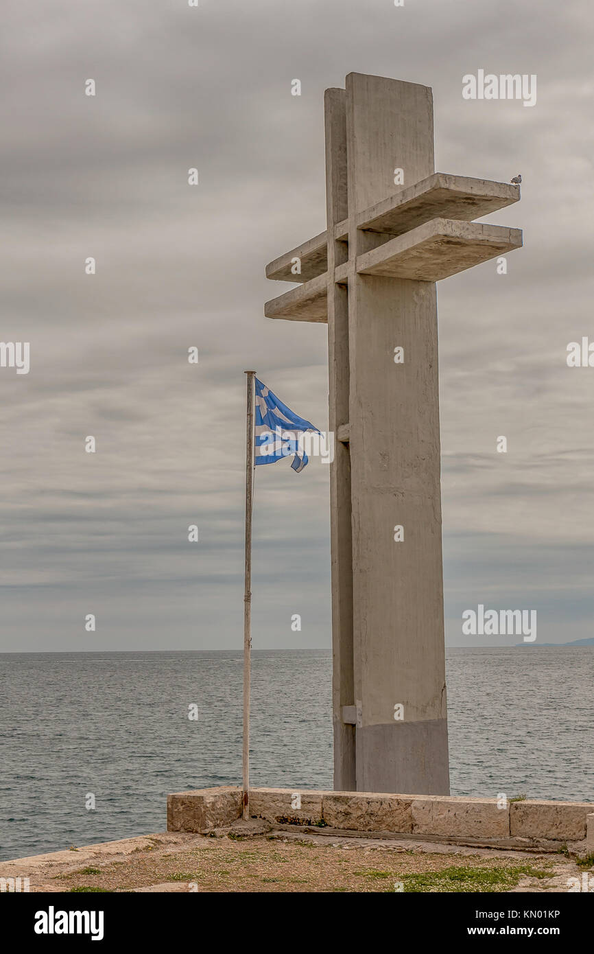 Piraeus, Greece -April 04, 2015: A huge Christian cross with the Greek ...