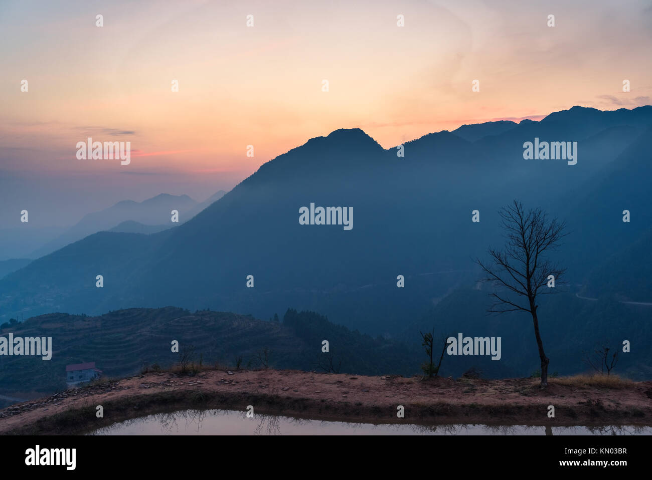 view of lake front of mountains with skyline in background Stock Photo ...