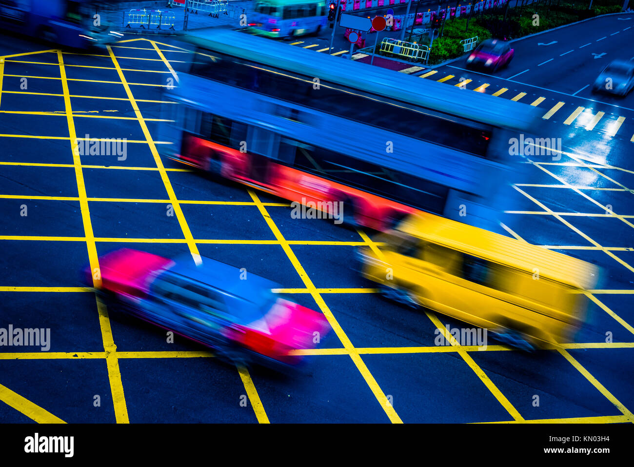 Cars driving through high street hi-res stock photography and images ...