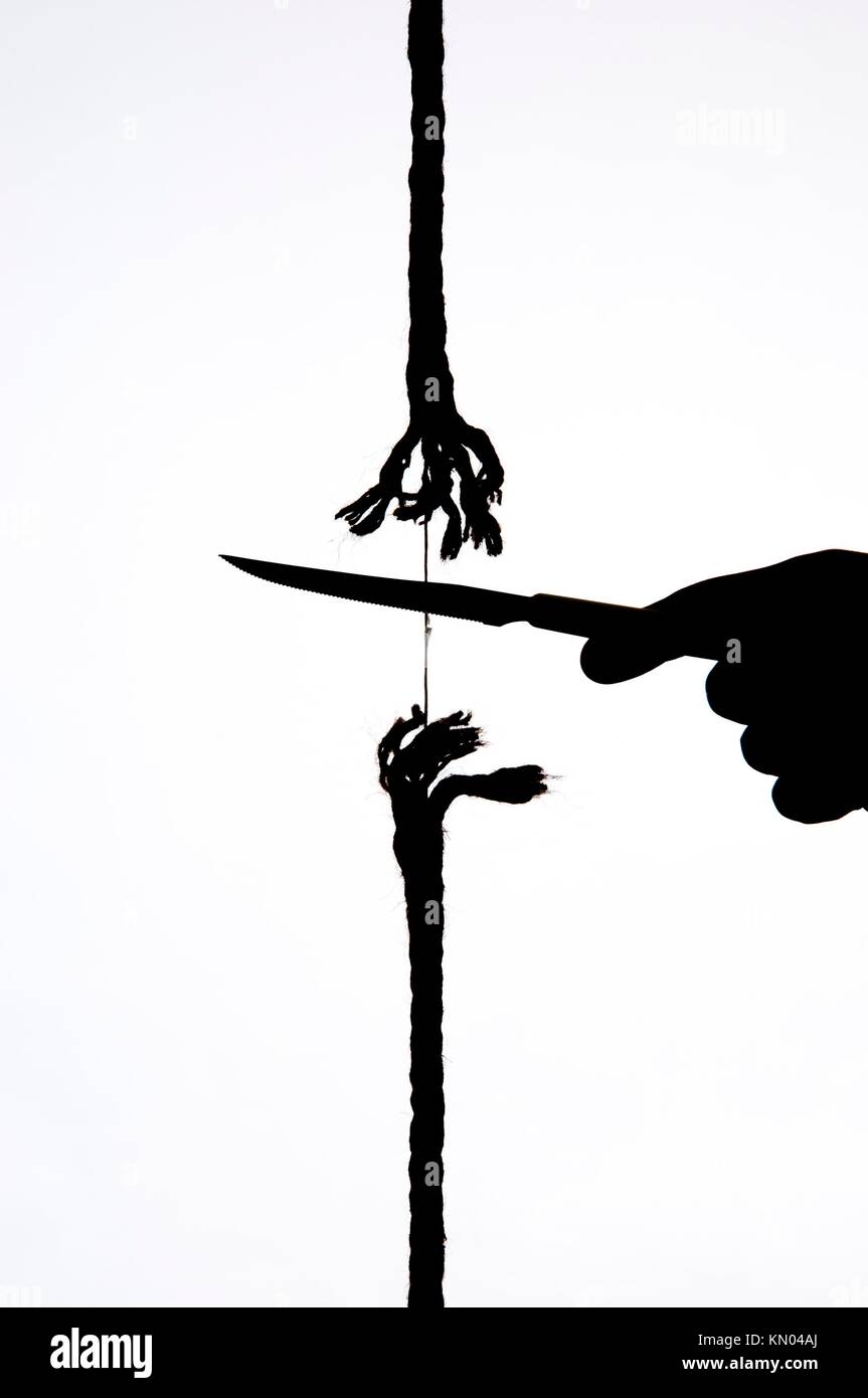 Cutting rope tension hi-res stock photography and images - Alamy